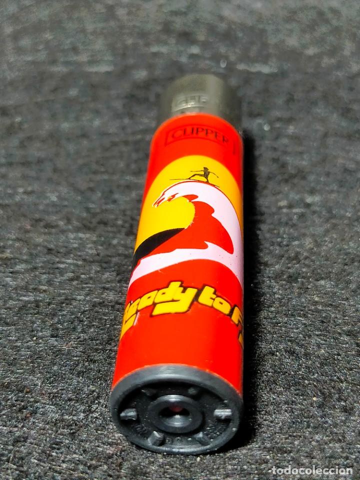 mechero clipper rojo surfeando la ola dibujo es - Comprar Mecheros ...